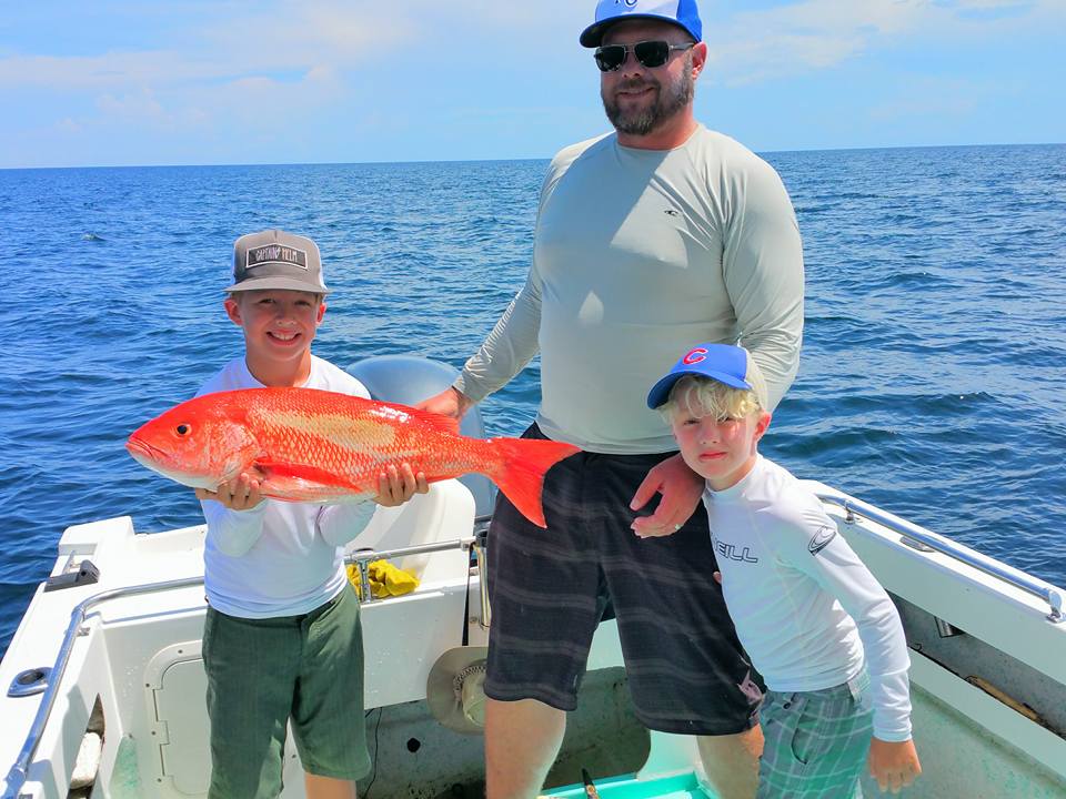 Marc Correll and kids with Red Snapper - Maria Teresa Sportfishing